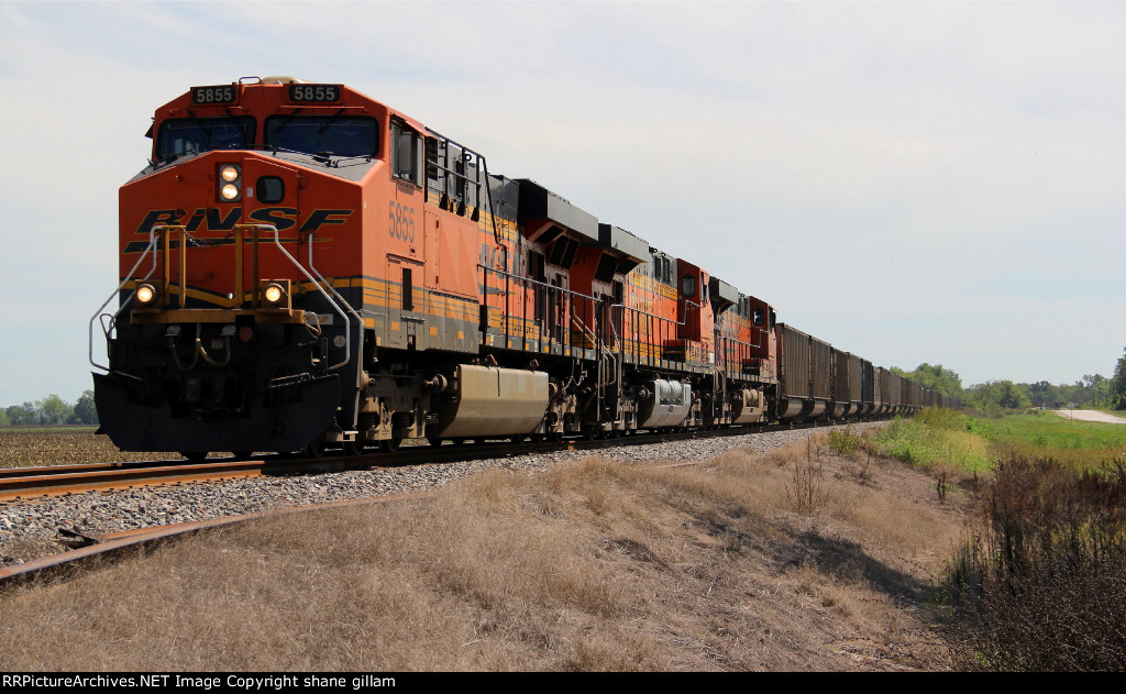 BNSF 5855 leads a coal train Nb with 3 Gevos on tap,